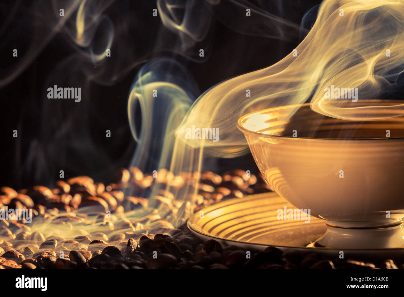Dry coffee with blue smoke Stock Photo - Alamy