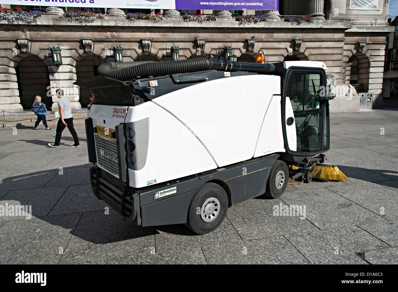 rubbish sweeper cleaning Nottingham market square Stock Photo - Alamy