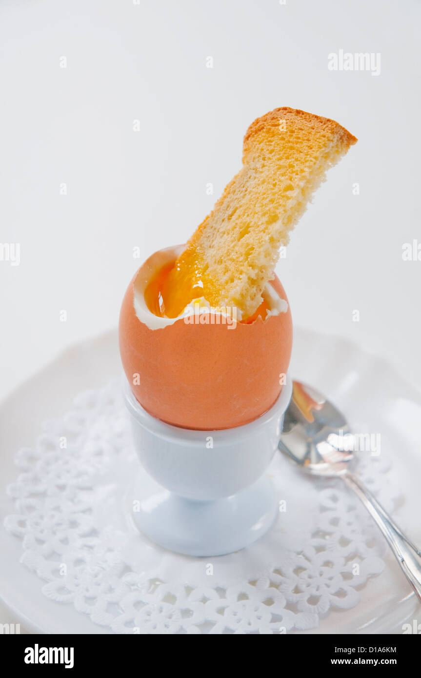 Boiled egg in egg cup Stock Photo - Alamy