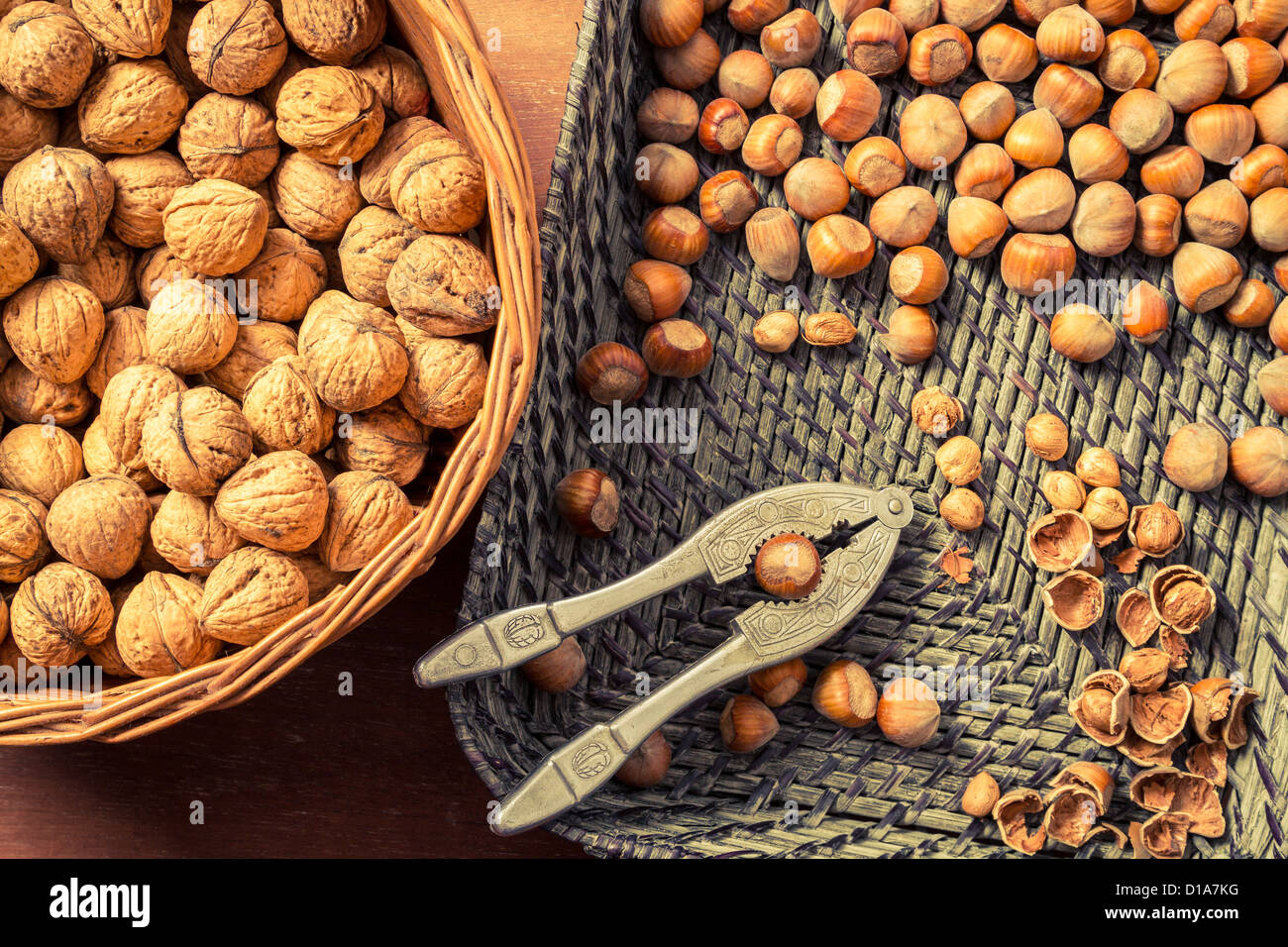 Autumn harvest of nuts in wicker baskets Stock Photo - Alamy