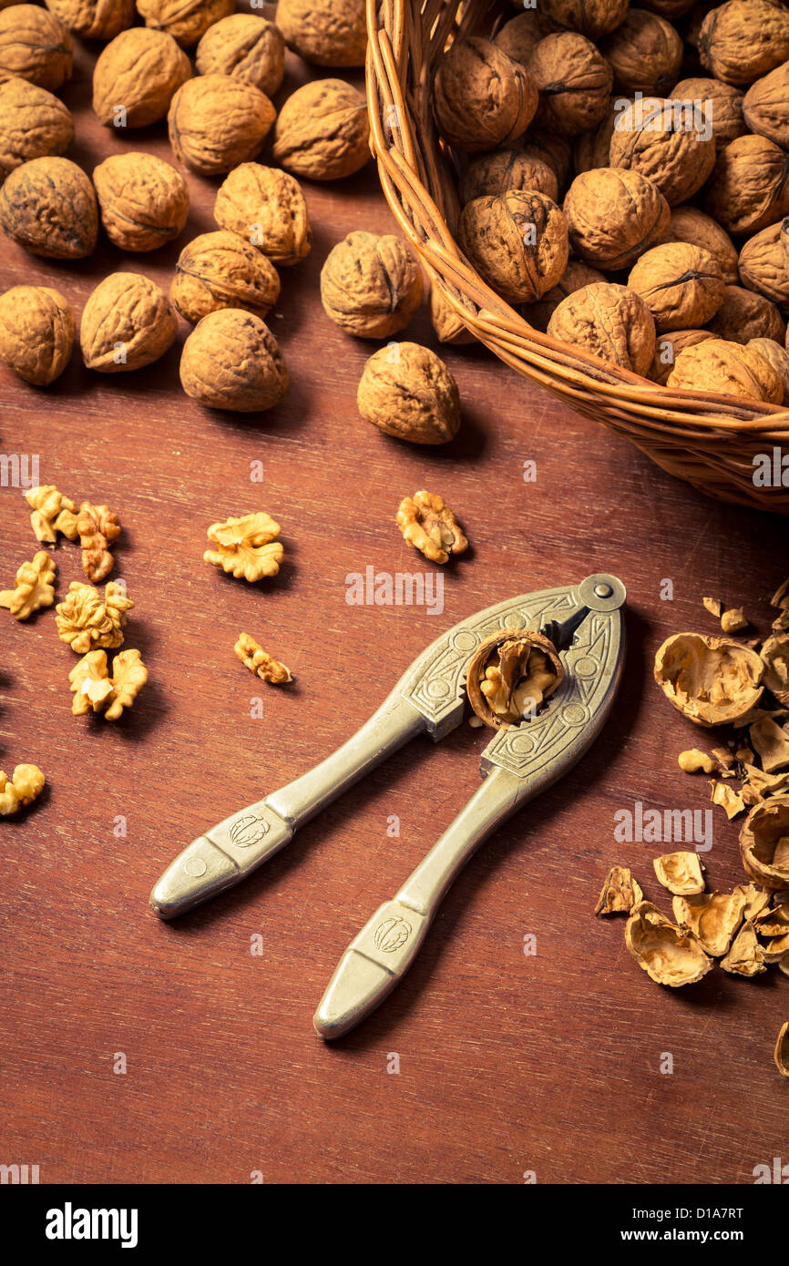 Walnuts falling on old wooden hi-res stock photography and images - Alamy