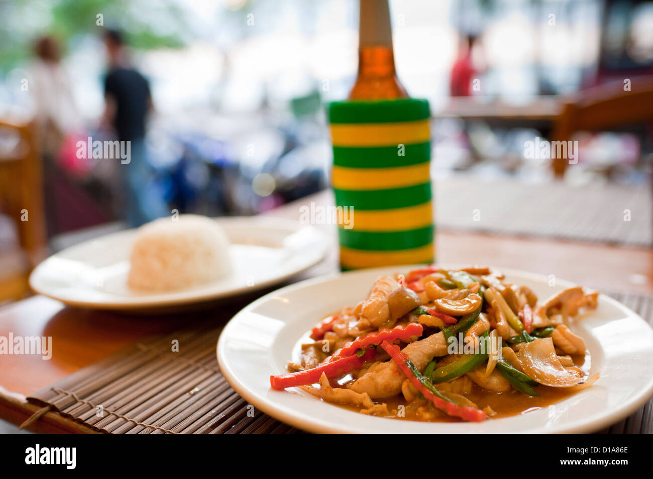 Spicy Thai chicken and beer, Pattaya Stock Photo - Alamy