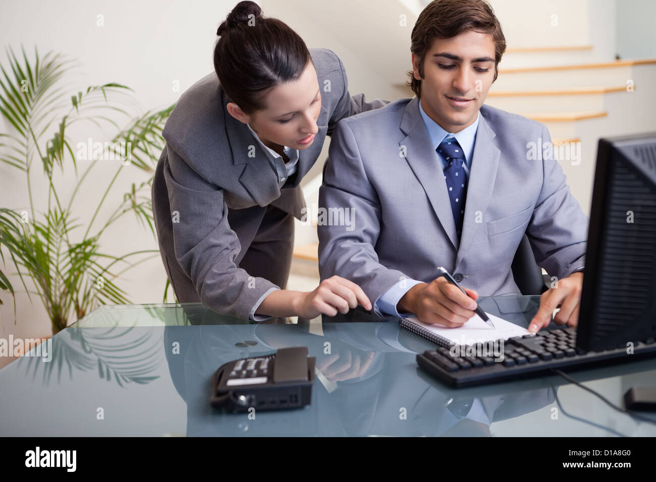Business colleagues at office Stock Photo - Alamy
