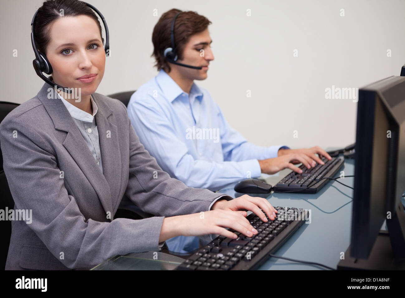 Two executives with headset hi-res stock photography and images - Alamy