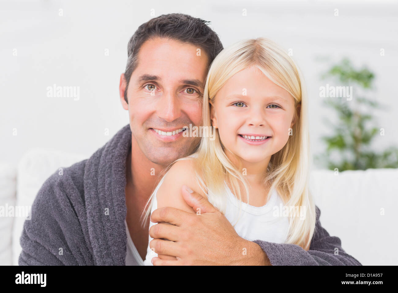 Father hugging his daughter Stock Photo - Alamy