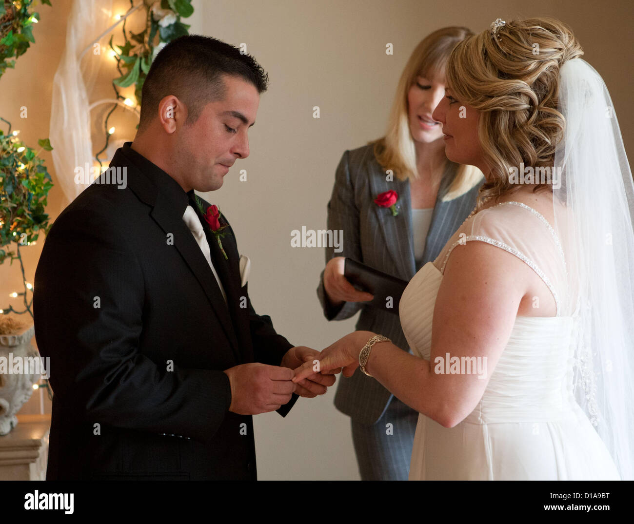 Dec. 12, 2012 - Modesto, CA, USA - Jeremy Wright puts the ring on his ...