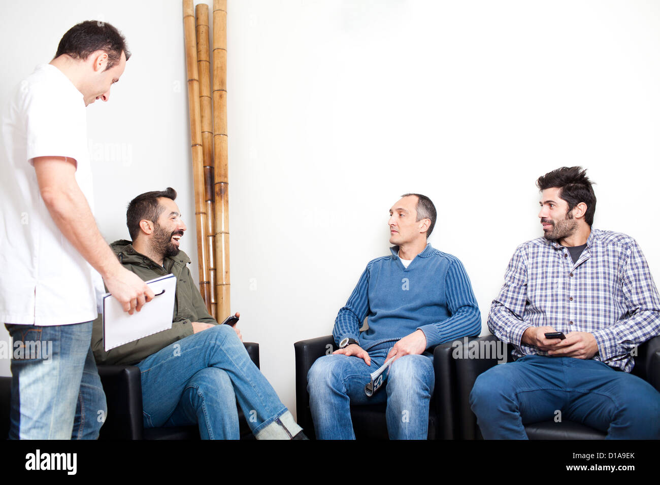 Handshake with doctor having fun in waiting room Stock Photo - Alamy