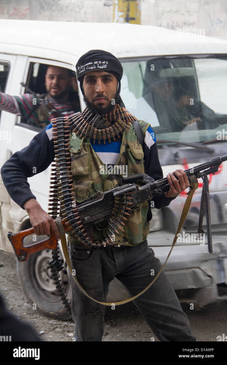 December 3, 2012 - Aleppo, Syria:A Free Syrian Army fighters stands for ...