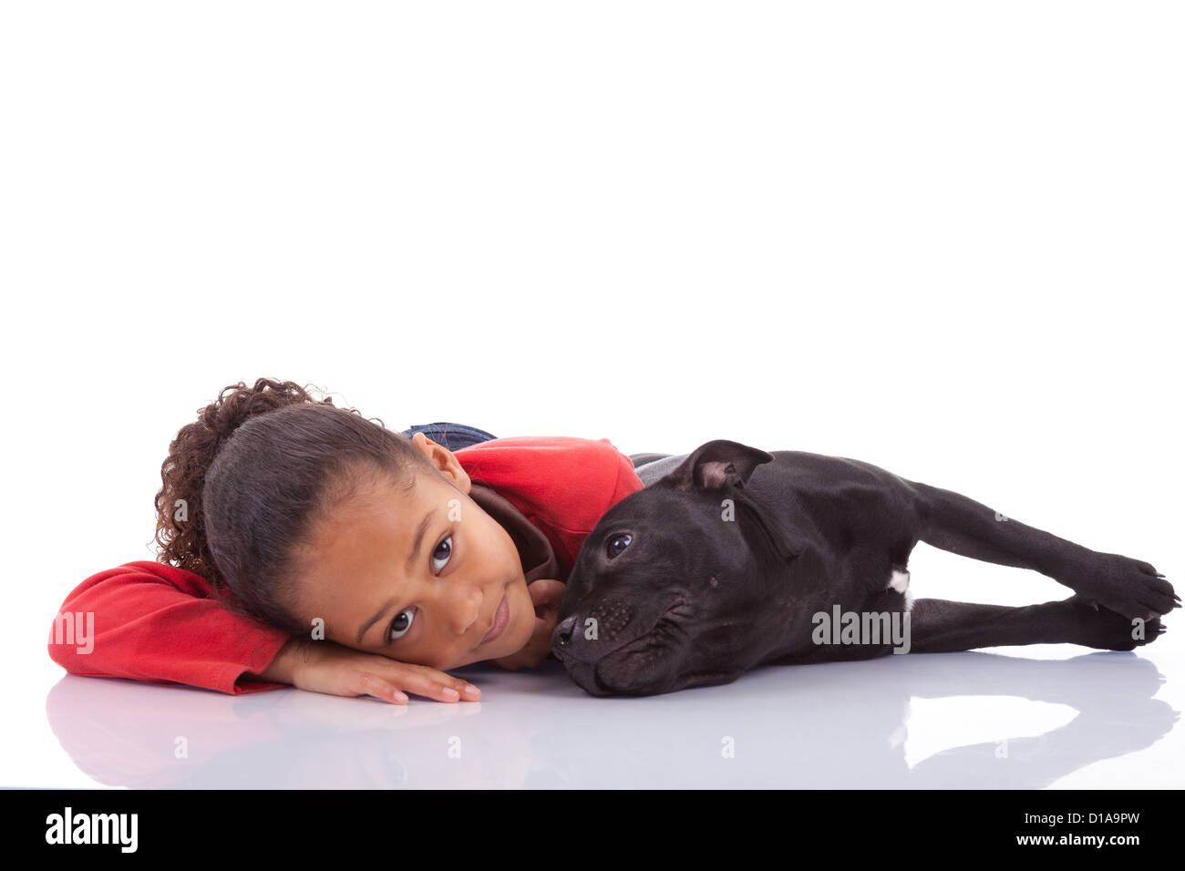 African American little girl with her pet, isolated on white background ...