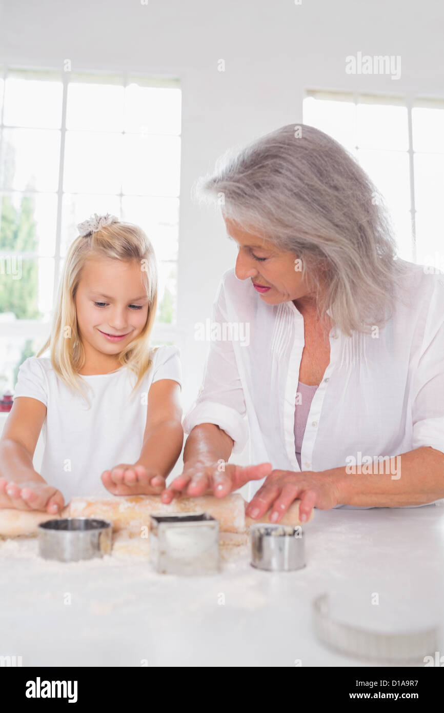 Child making biscuits hi-res stock photography and images - Alamy