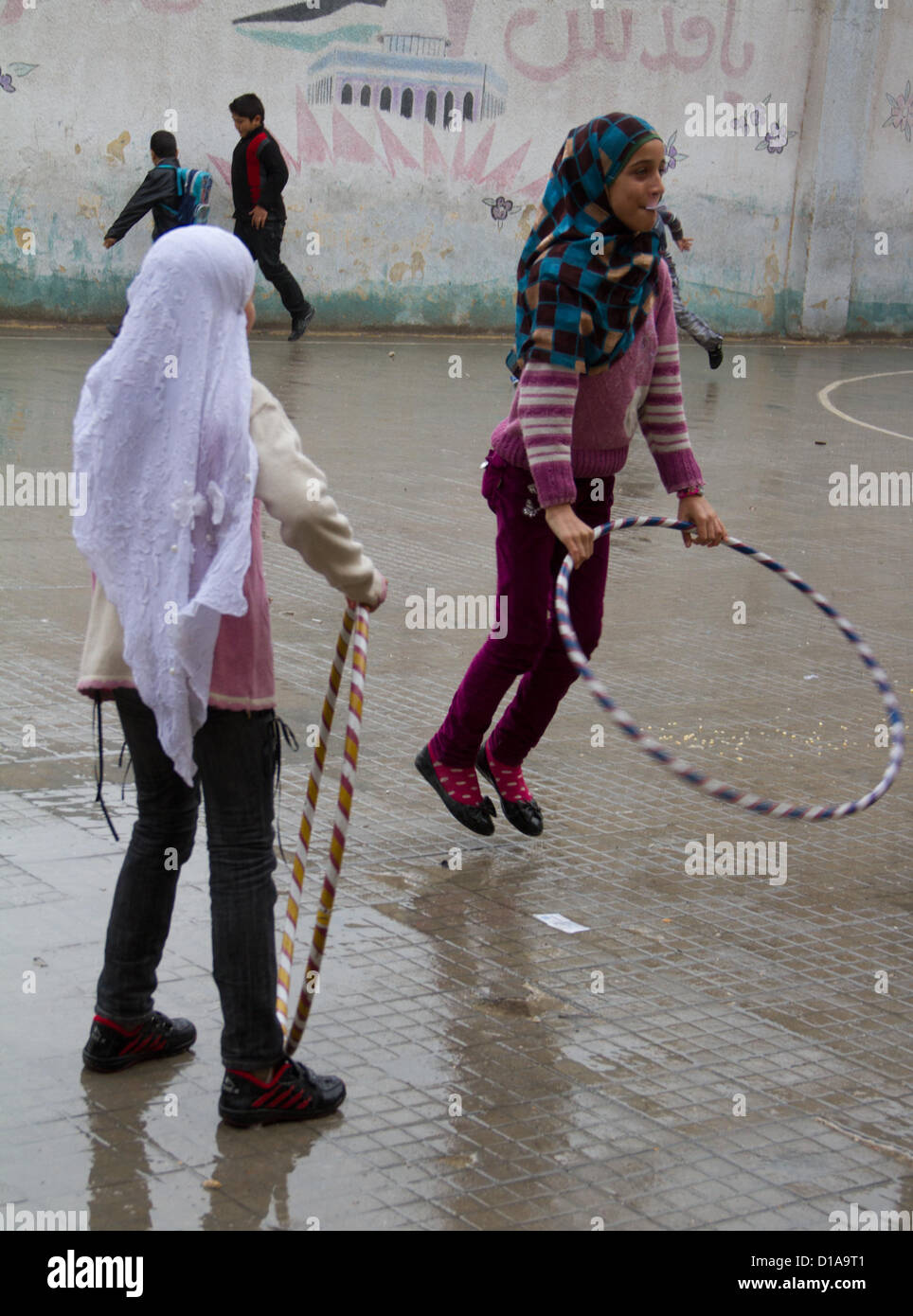 Aleppo, Syria: Children play after school on a play ground. This school ...