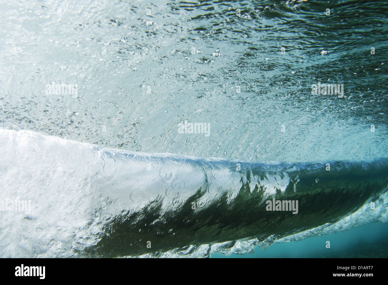 Hawaii, Long Blue Curl Of A Wave From Underwater Stock Photo - Alamy