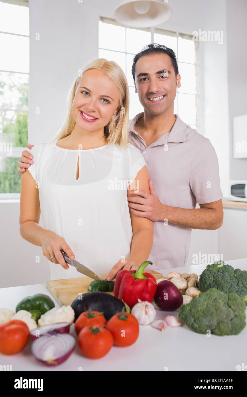 Couple preparing the dinner Stock Photo - Alamy