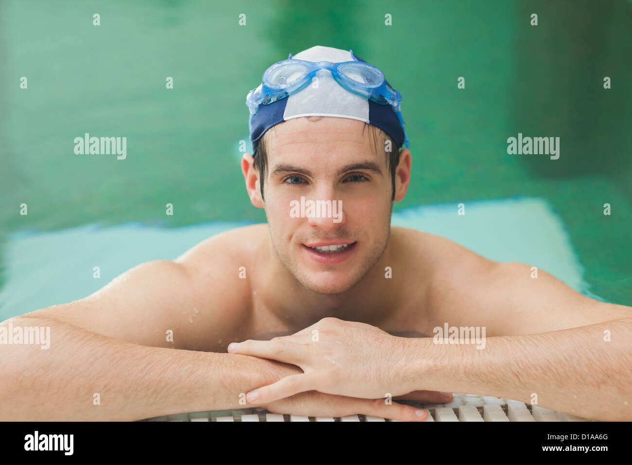 Happy man in the swimming pool Stock Photo - Alamy