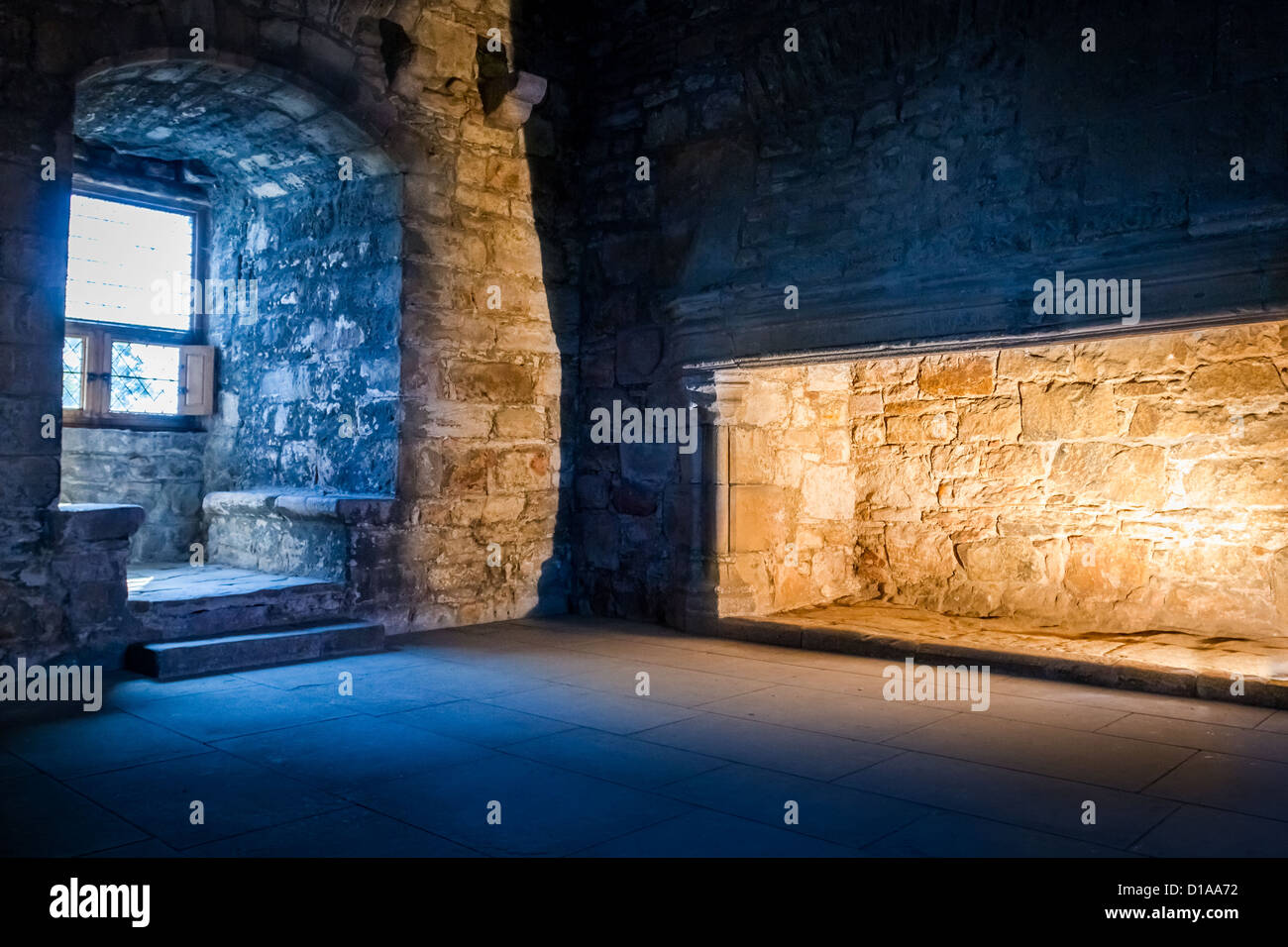 Cold outside and warm inside concept in old medieval castle Stock Photo ...