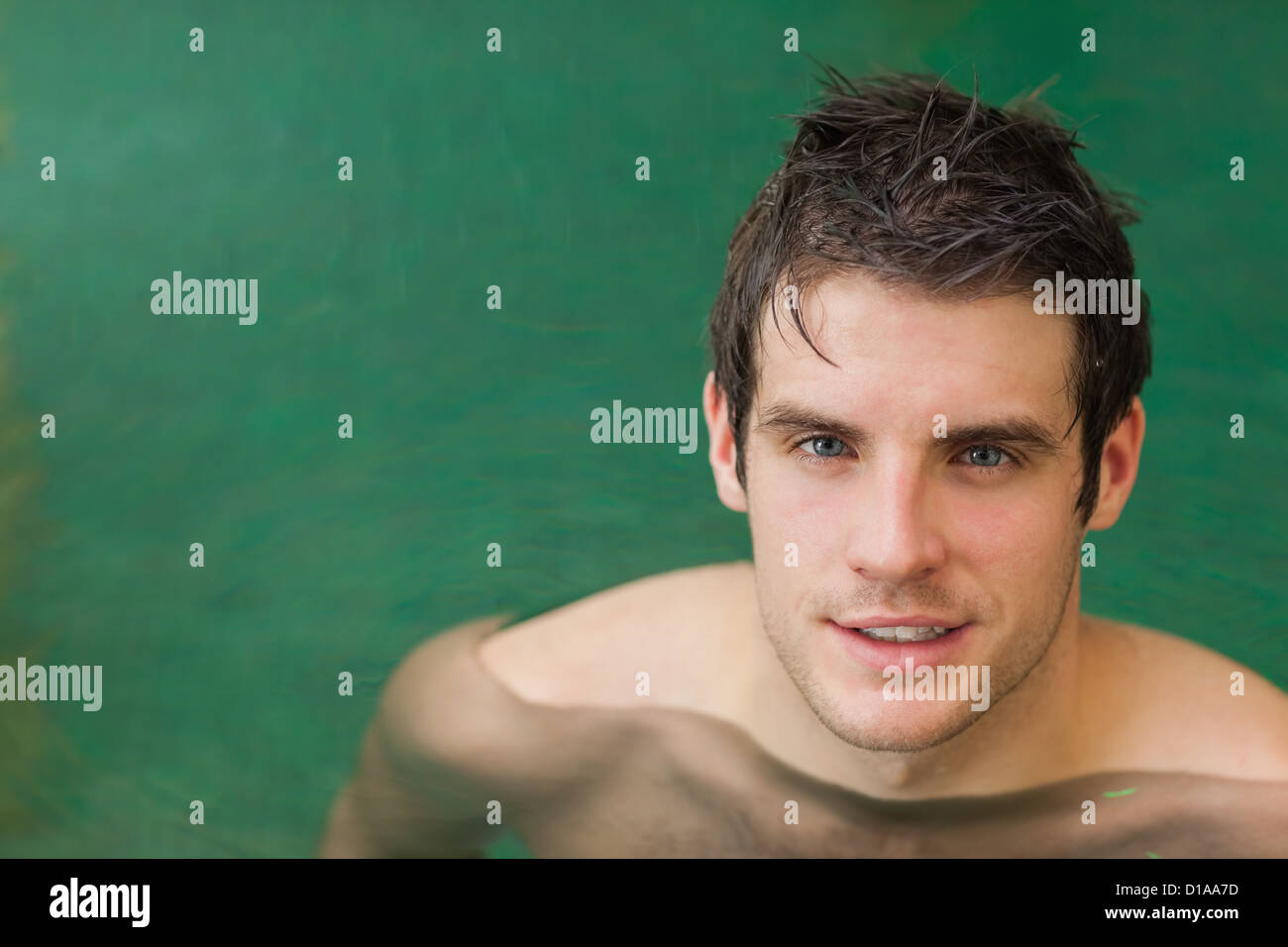 Handsome man in the swimming pool Stock Photo - Alamy