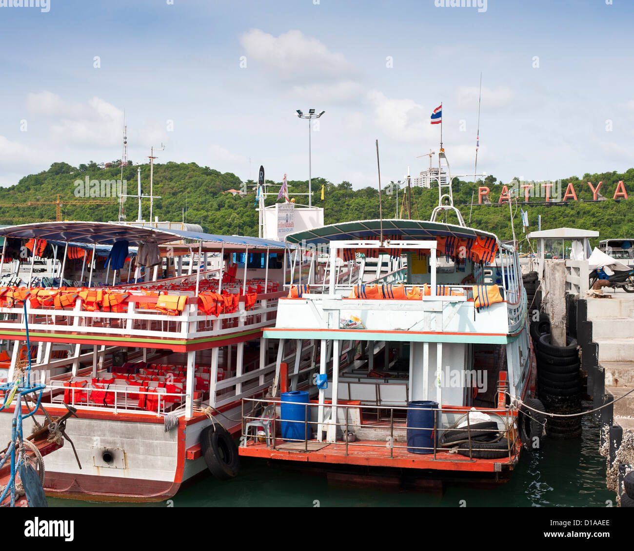 Tourist boats at the quay, Pattaya Stock Photo - Alamy