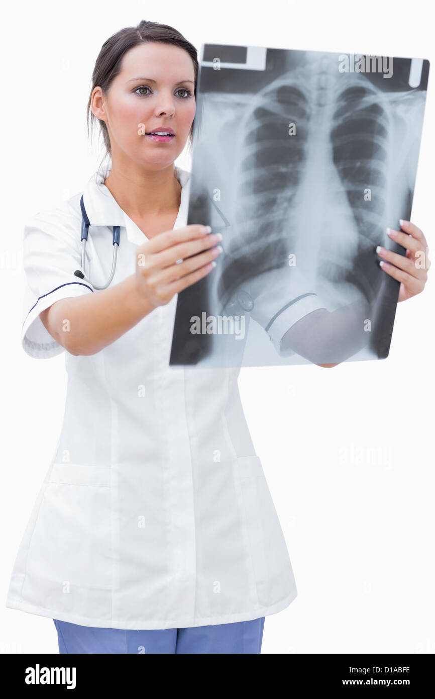 Young nurse examining x-ray Stock Photo - Alamy