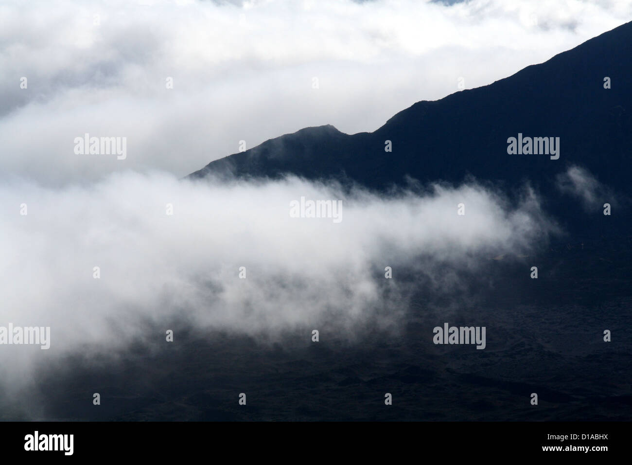 Fog and clouds on Haleakala volcano, Maui, Hawaii Stock Photo - Alamy