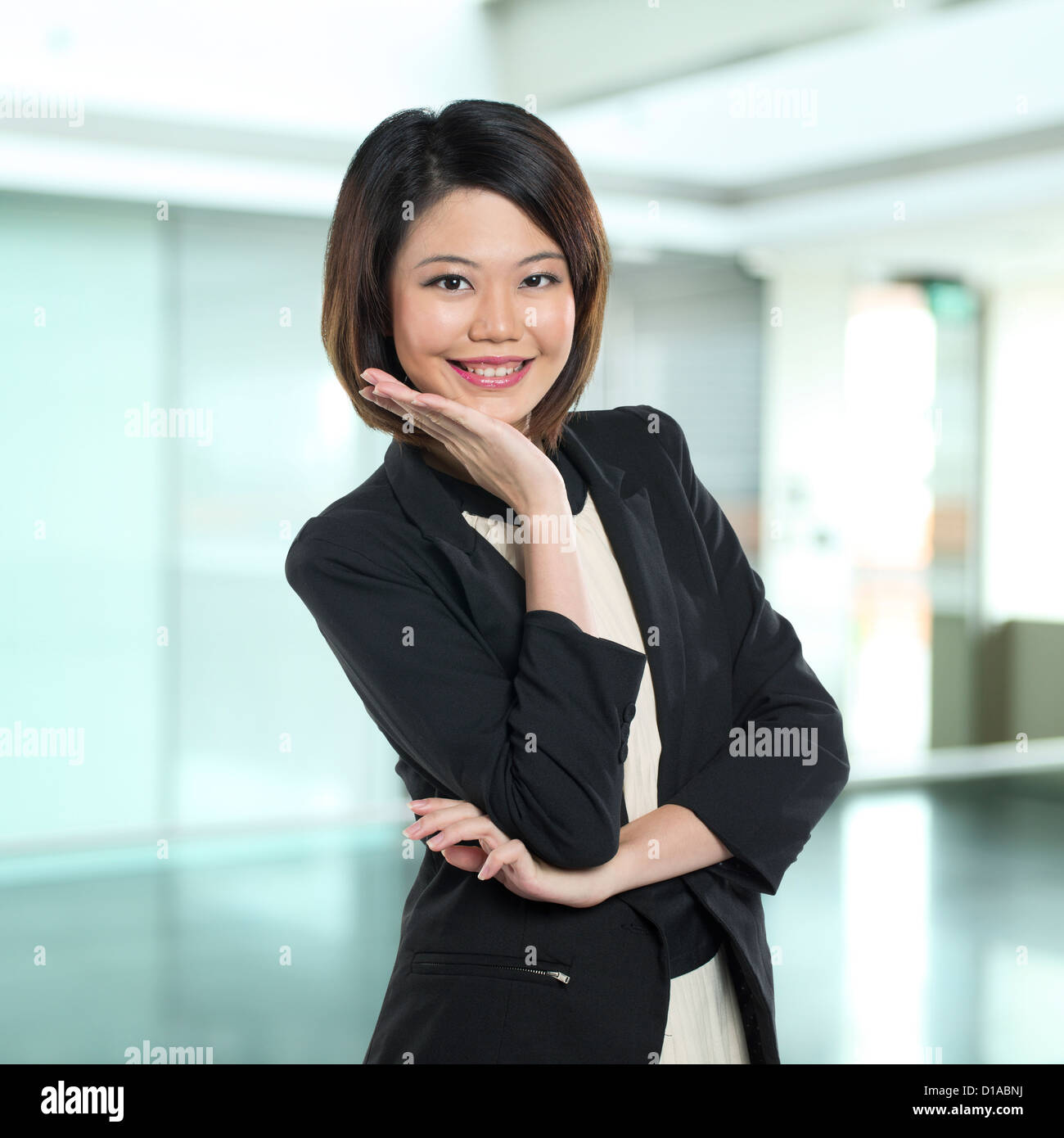 Beautiful Chinese business woman with friendly smile Stock Photo - Alamy