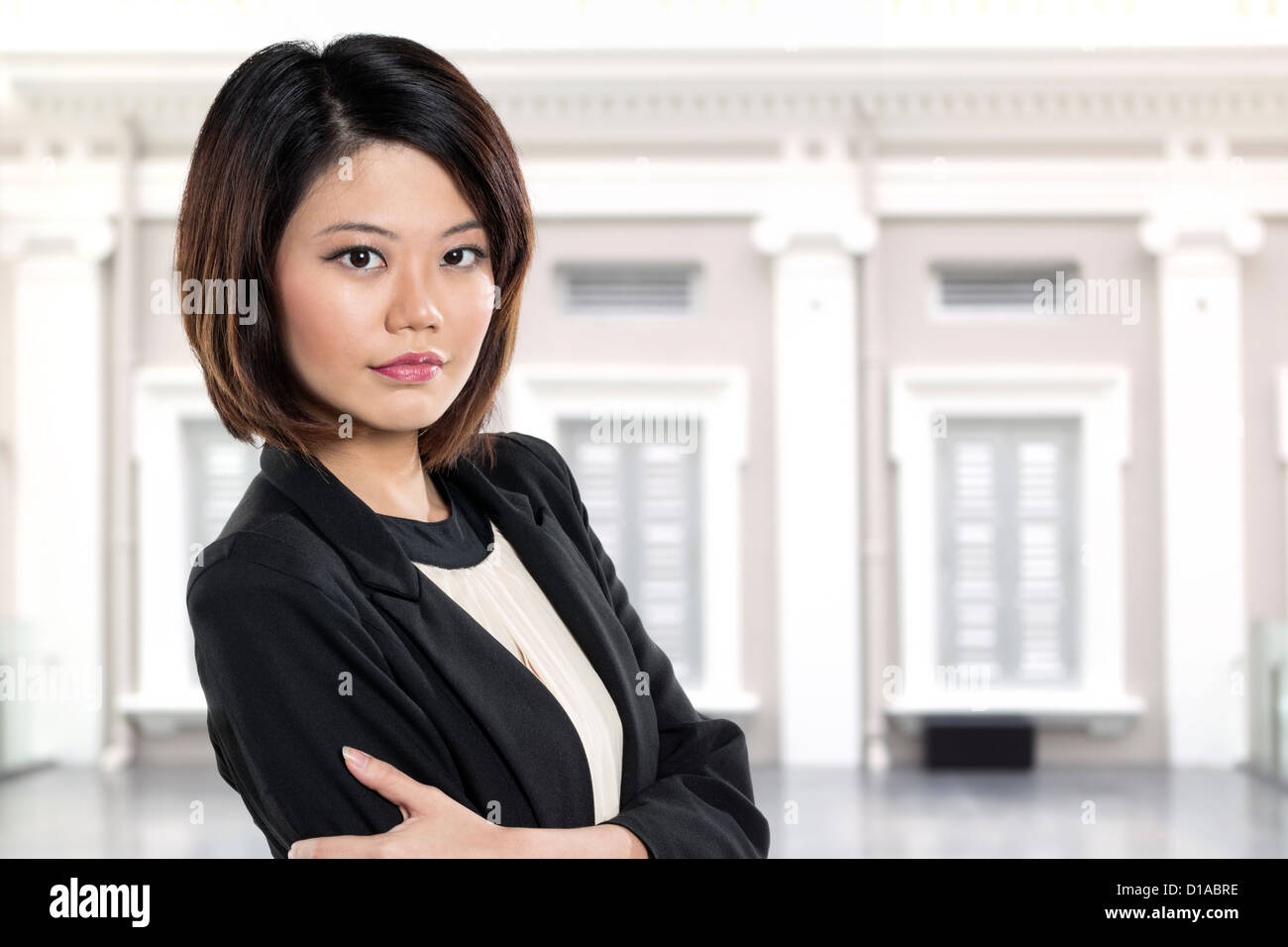 Beautiful Chinese business woman with friendly smile Stock Photo - Alamy