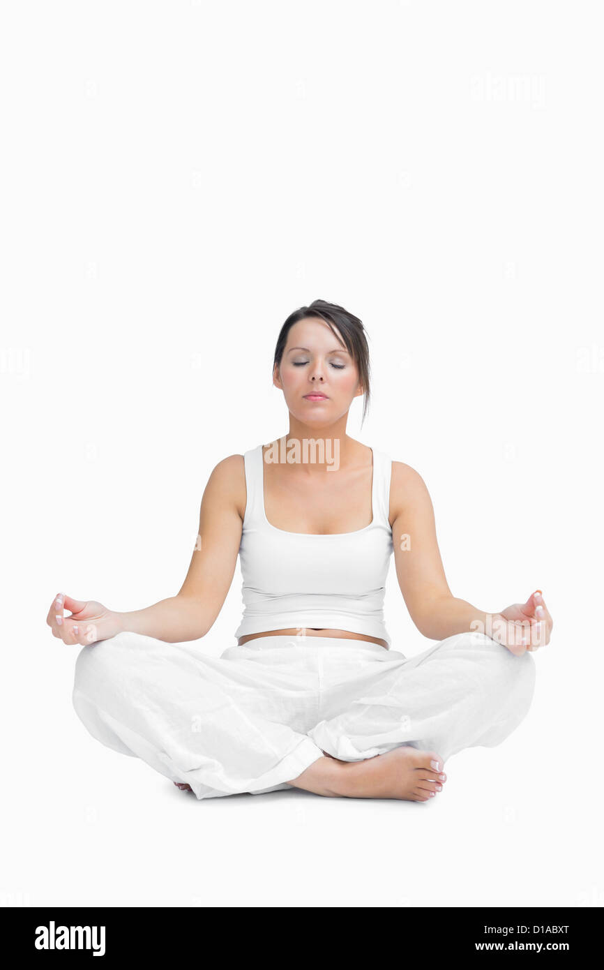 Young woman sitting in lotus position Stock Photo - Alamy