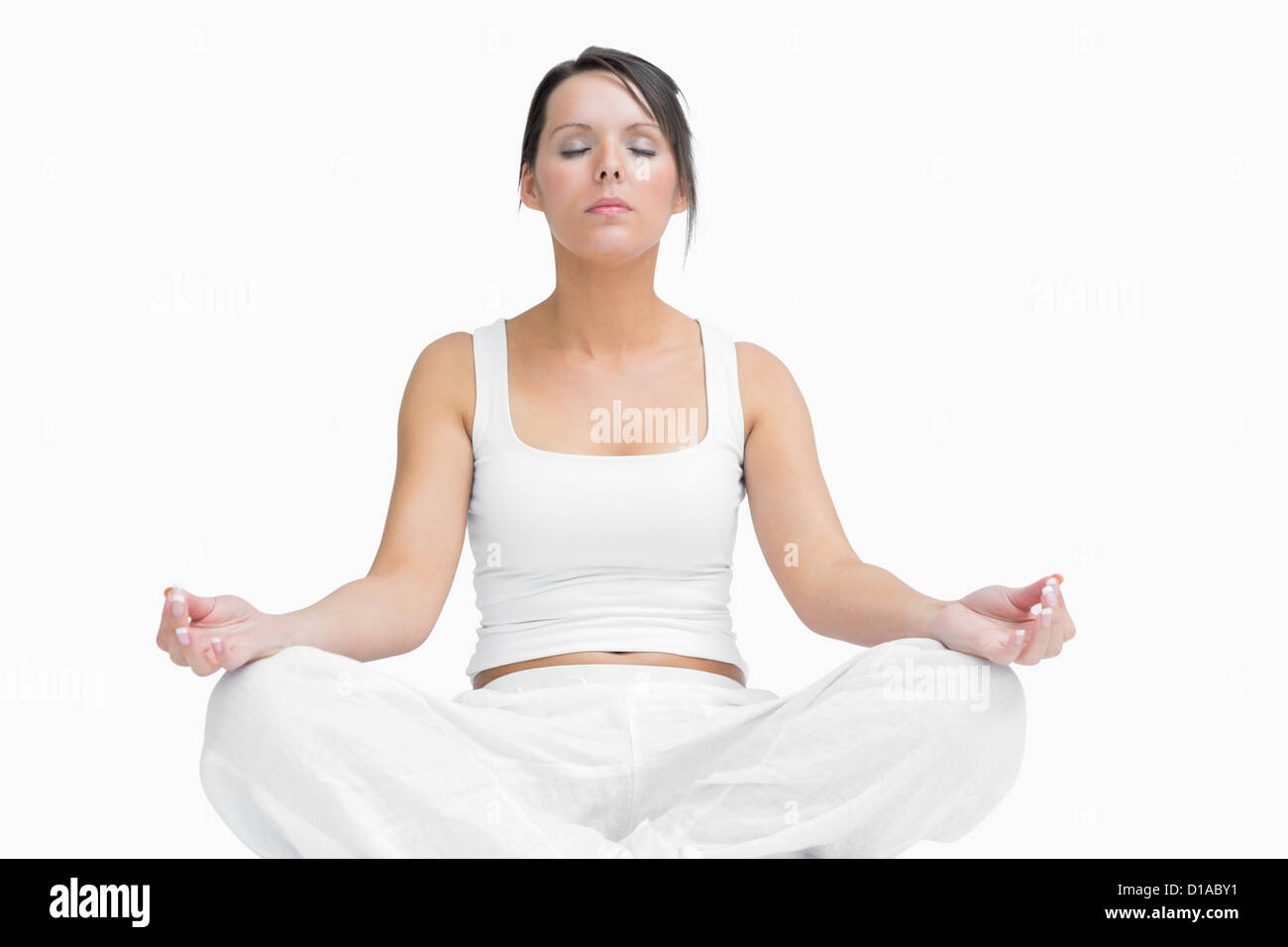 Young woman sitting in lotus position Stock Photo - Alamy