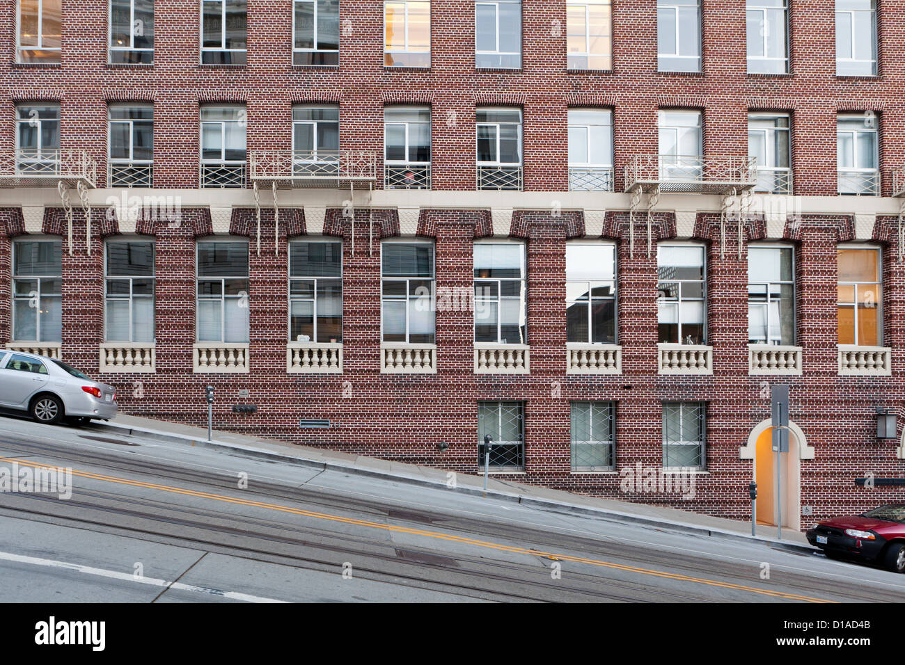 Brick building on heavy sloped street - San Francisco, California USA ...