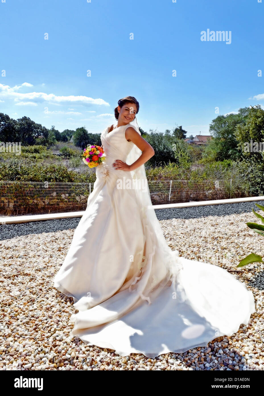 Beautiful bride portrait outside home Stock Photo - Alamy
