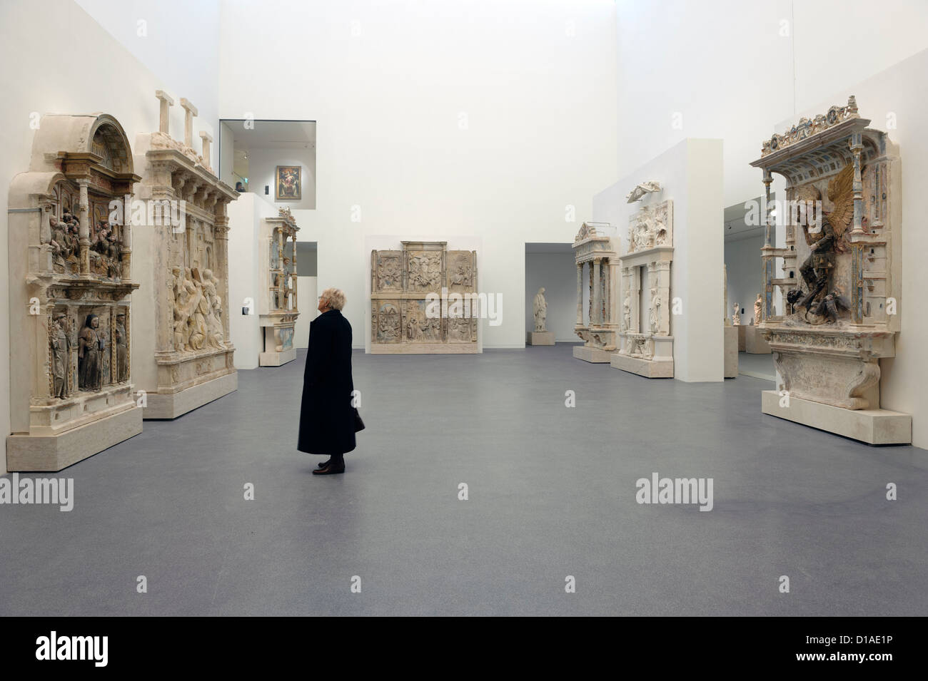 Visitor looking at sacral art at the Machado de Castro museum in ...
