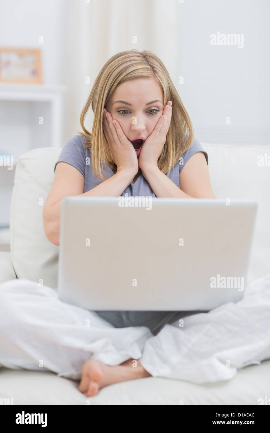 Woman shocked computer screen hi-res stock photography and images - Alamy