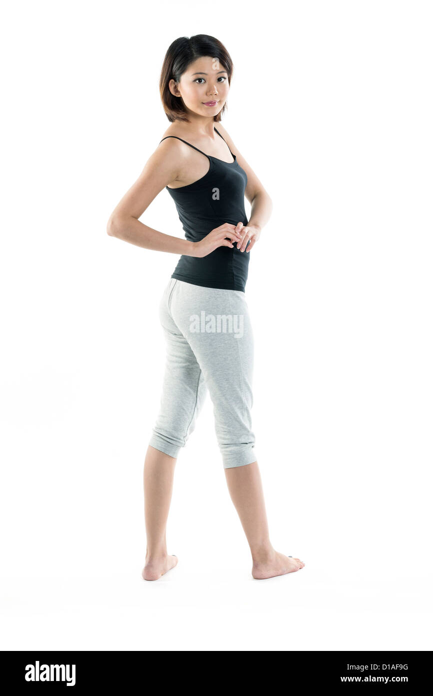 Beautiful Chinese woman doing exercise. Fitness and healthy lifestyle ...