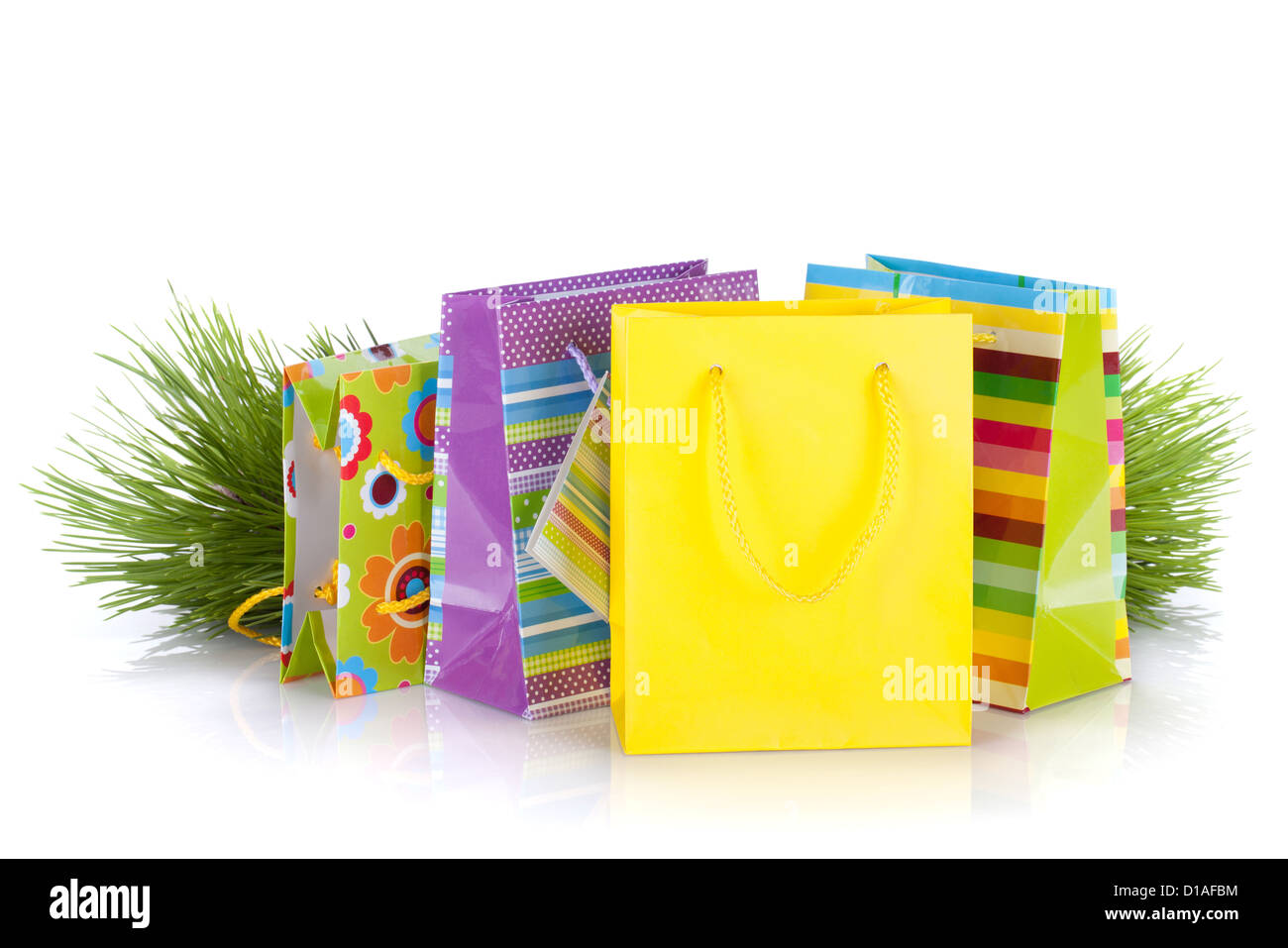 Colorful gift bags with christmas gifts. Isolated on white background ...