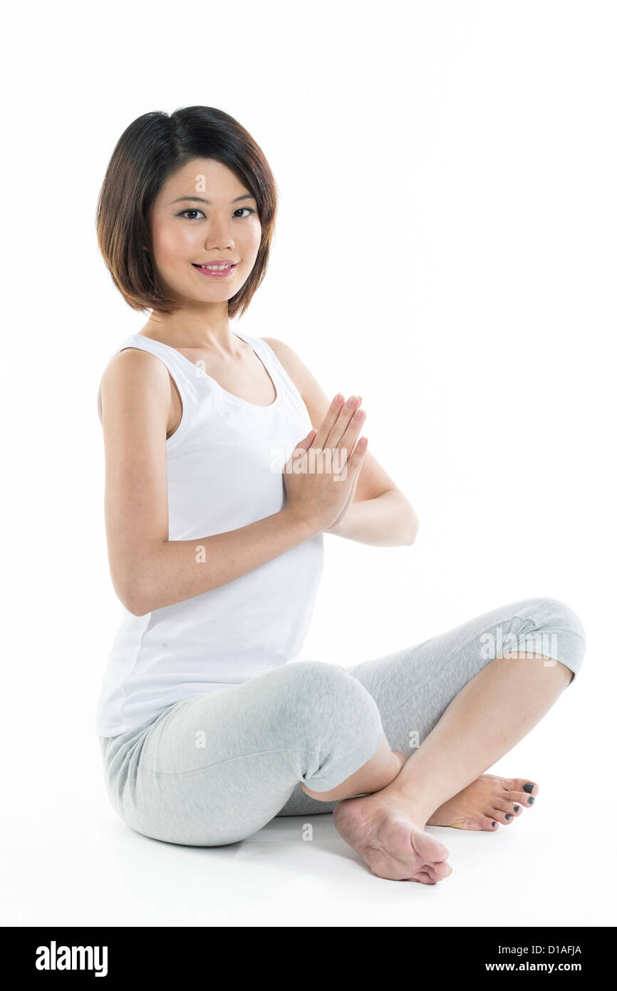 Beautiful Chinese woman doing exercise. Fitness and healthy lifestyle ...