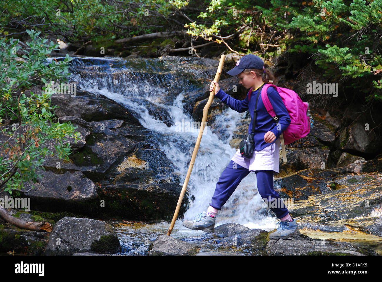Girl crossing a stream in Oregon's Wallowa Mountains Stock Photo - Alamy