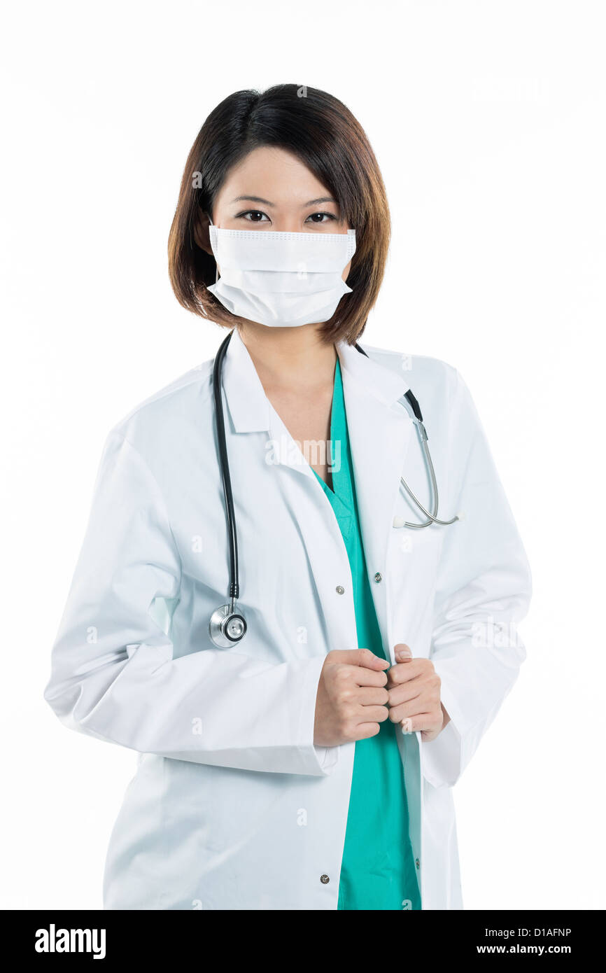 Portrait of a cute Female Chinese doctor wearing a green scrubs, lab ...