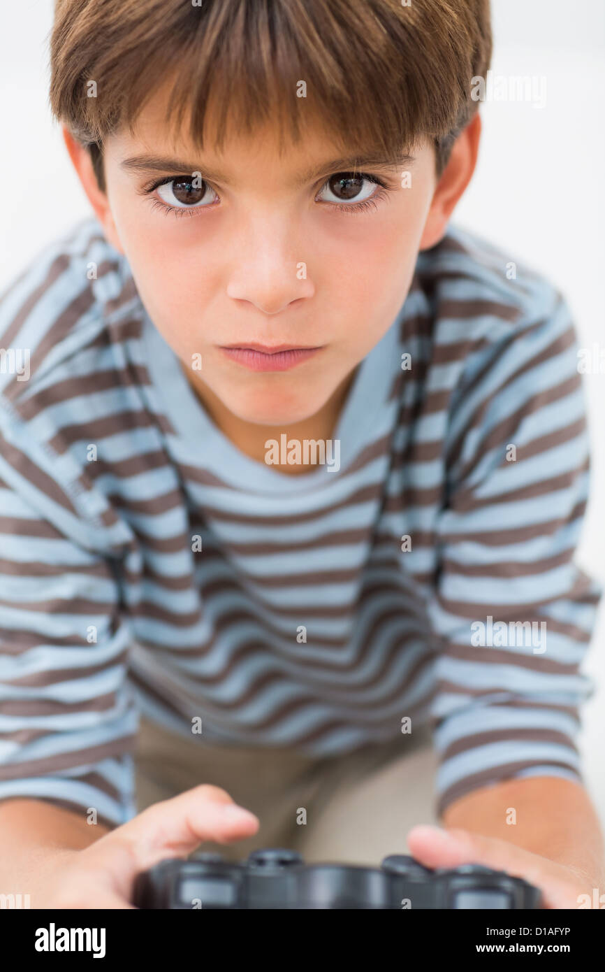 Little boy playing games console Stock Photo - Alamy
