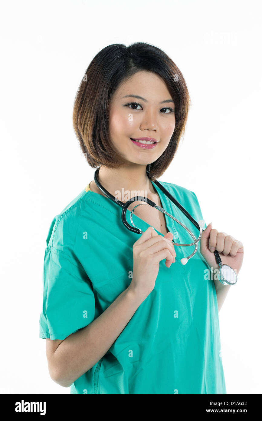Portrait of a cute Female Chinese doctor wearing a medical clothing ...