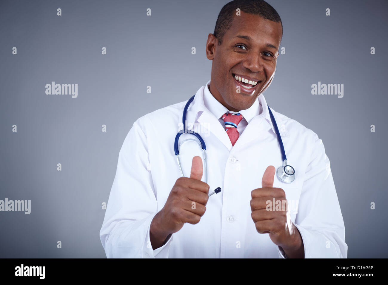 African american doctor thumbs up hi-res stock photography and images ...