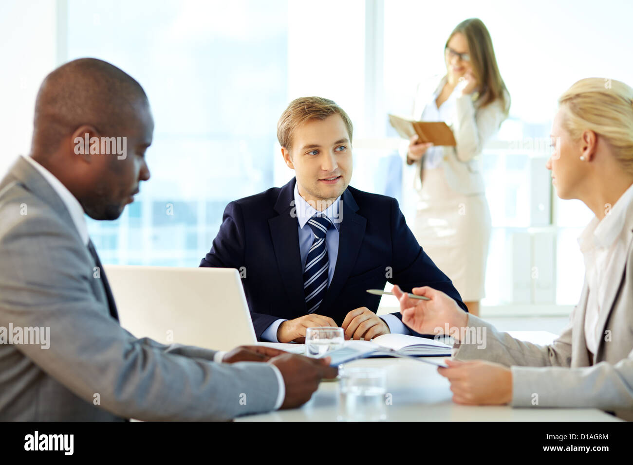 Confident caucasian female ceo explaining hi-res stock photography and ...