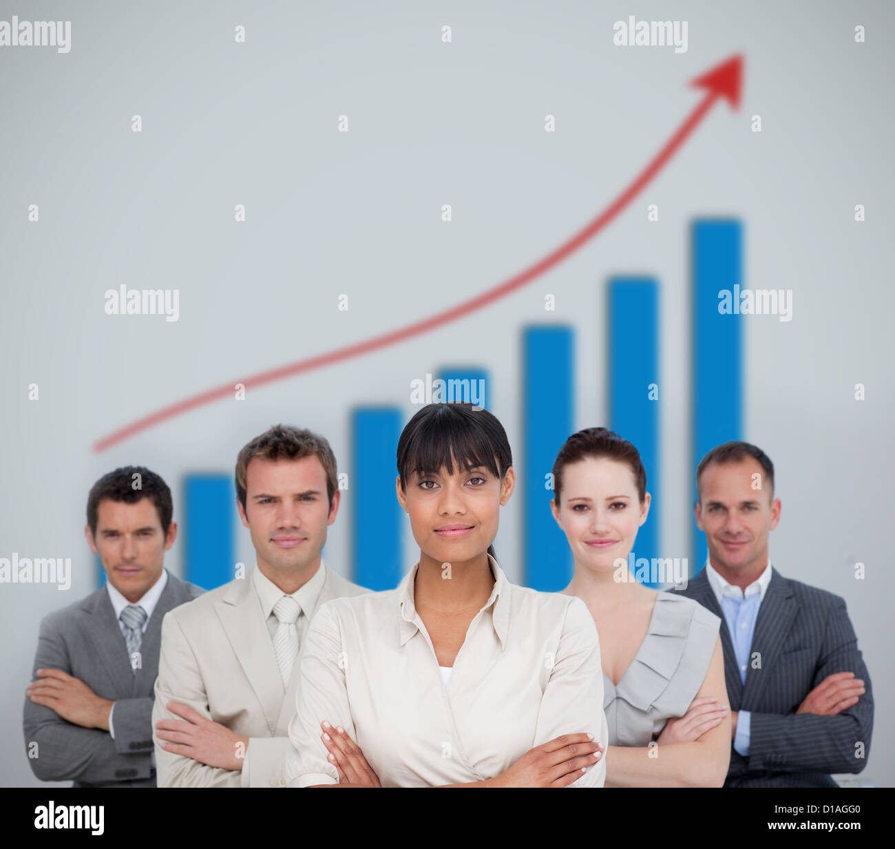 Business team smiling with a graph illustration Stock Photo - Alamy