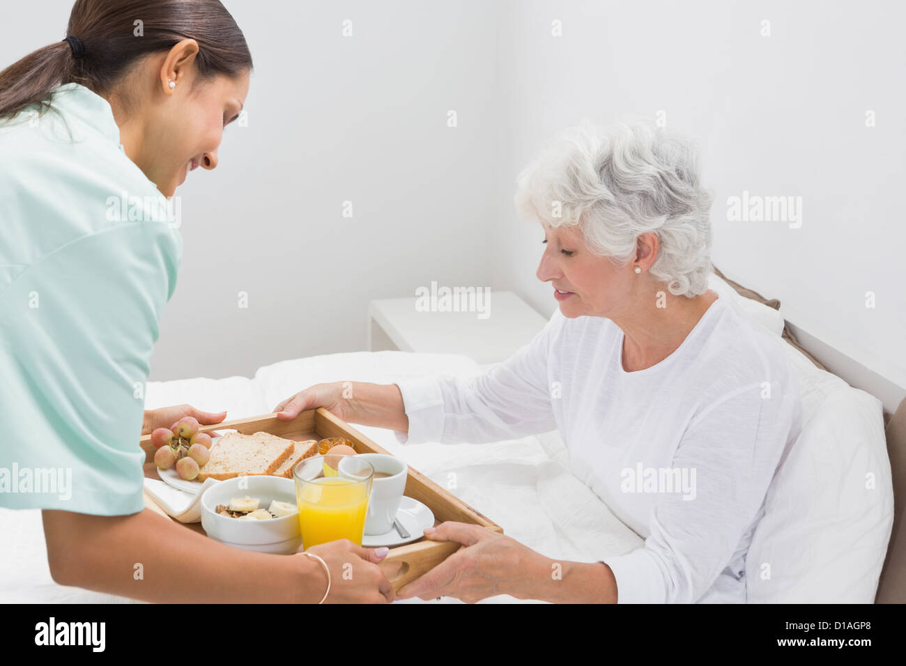 Portrait smiling nurse breakfast hi-res stock photography and images ...
