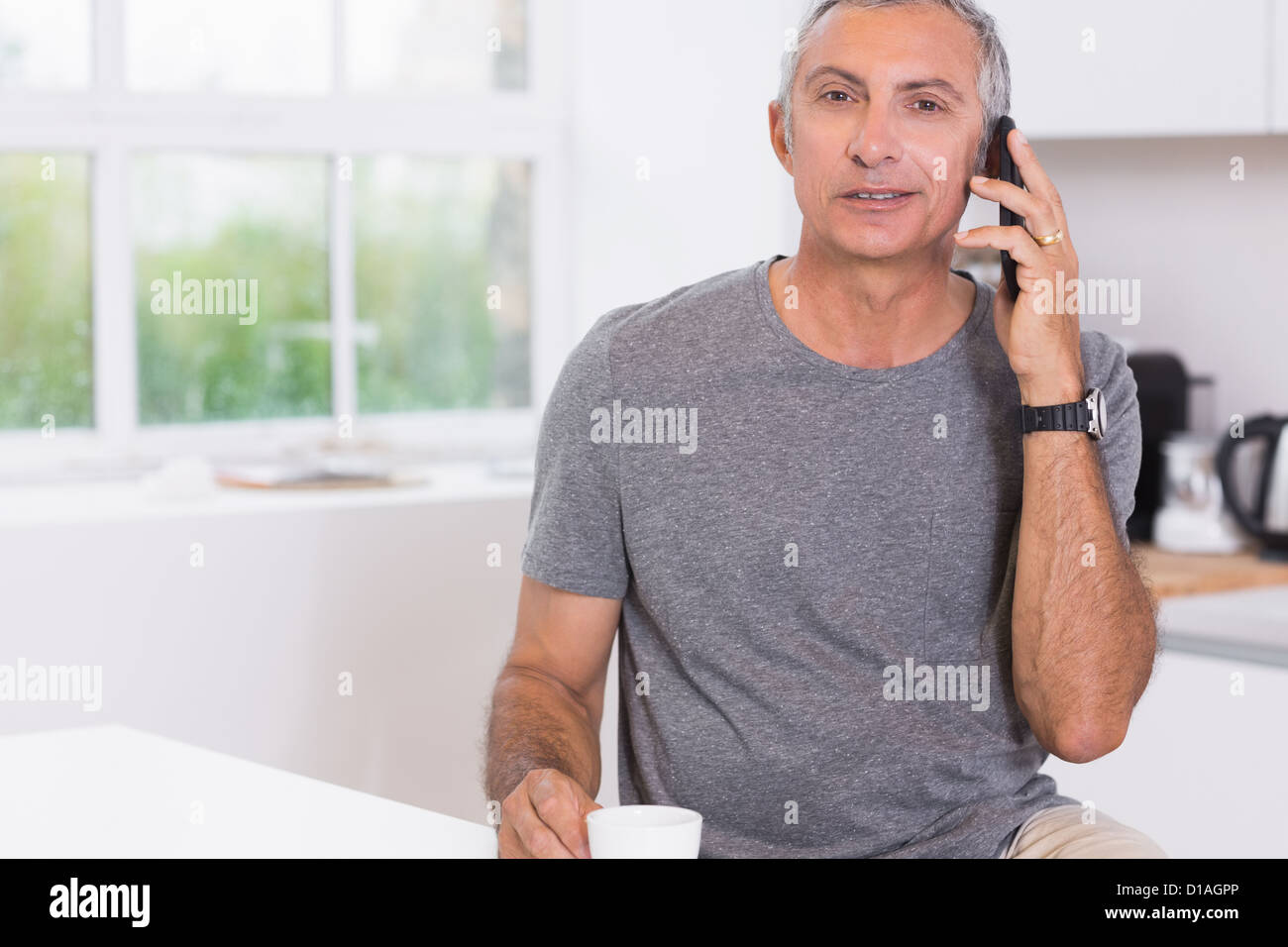 Man calling someone Stock Photo - Alamy
