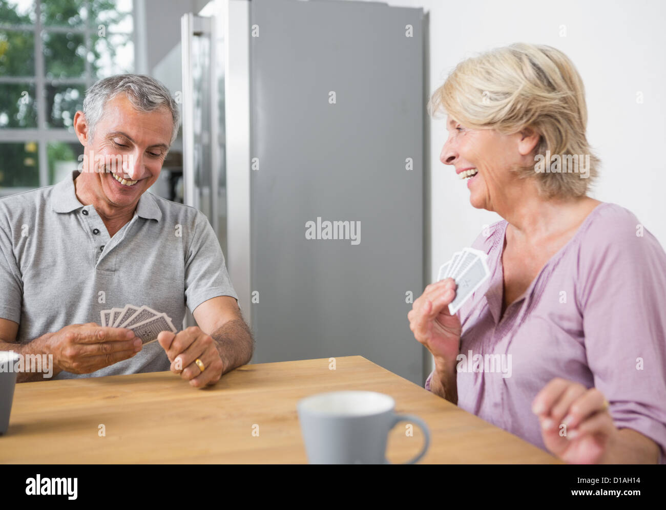 Couple playing cards Stock Photo - Alamy