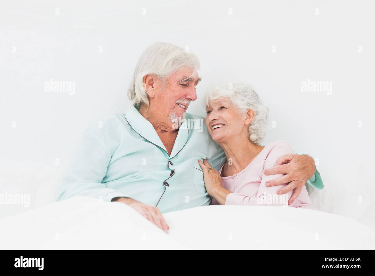 Elderly couple in bed Stock Photo - Alamy