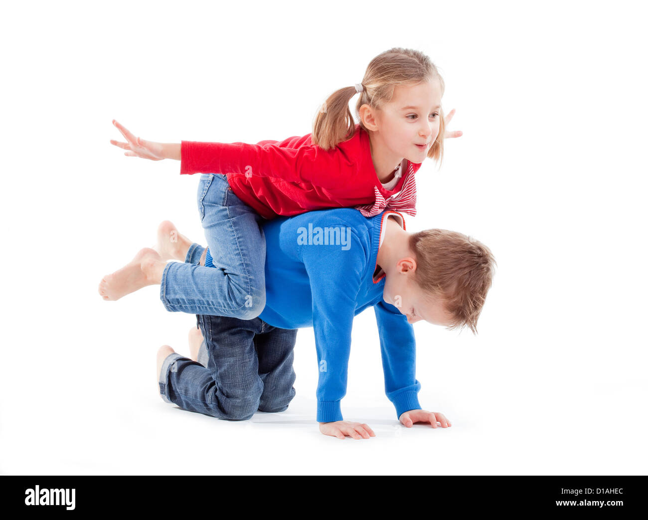 brother and sister having fun with each other - isolated on white Stock ...