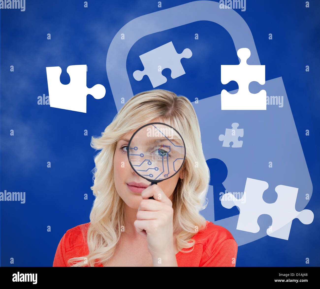 Woman looking through magnifying glass Stock Photo - Alamy