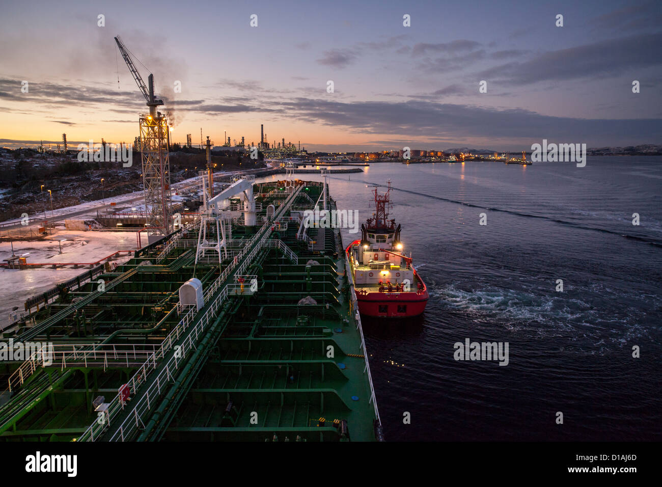 Oil tanker being moored at the Mongstad oil terminal and refinery in ...