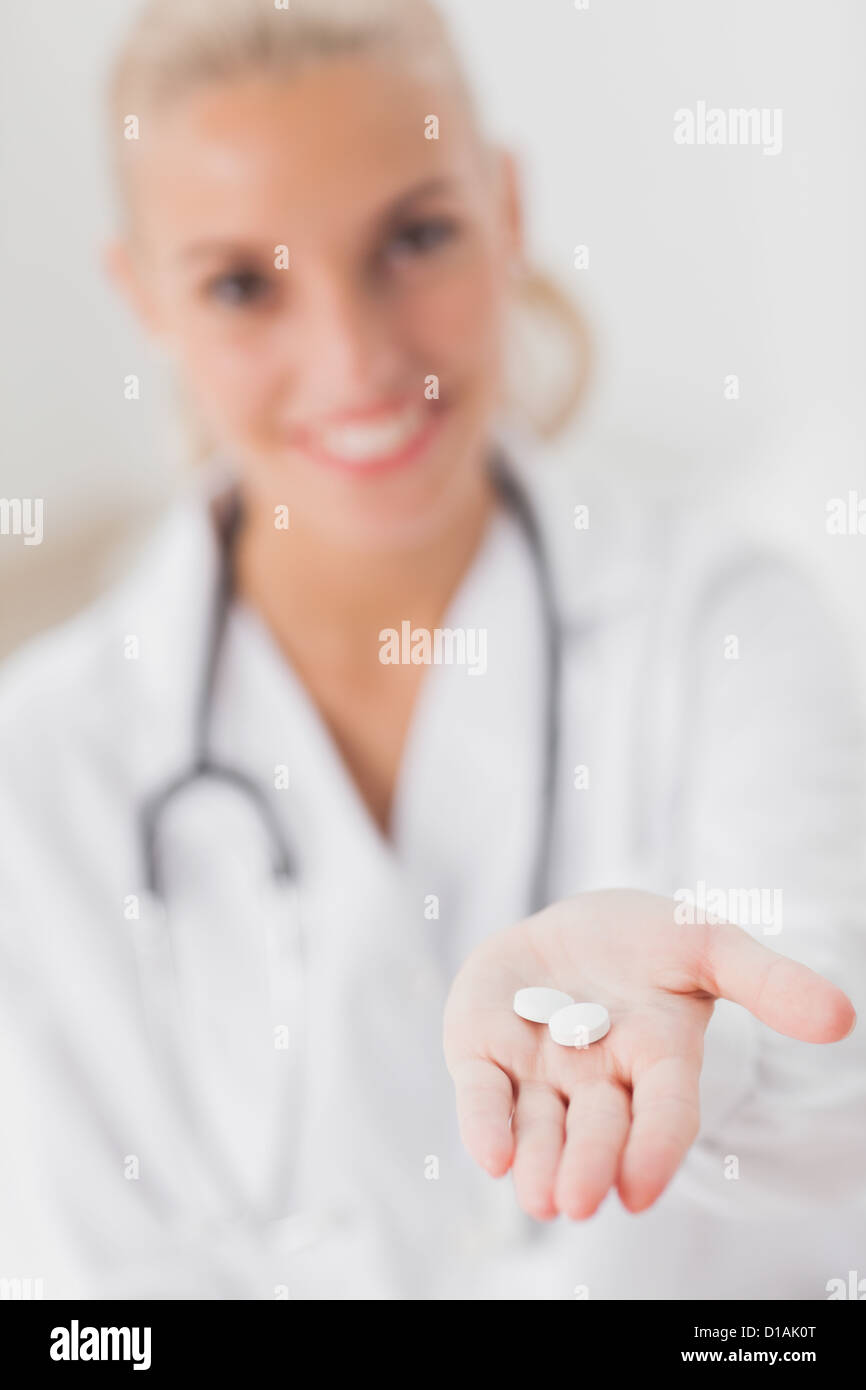 Handing out medication hi-res stock photography and images - Alamy