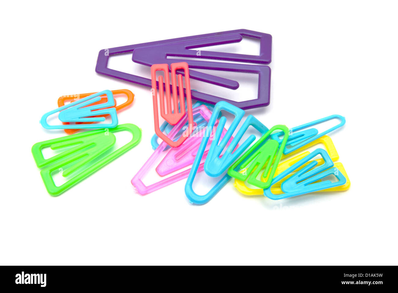 Colorful paper-clips isolated on white background Stock Photo - Alamy